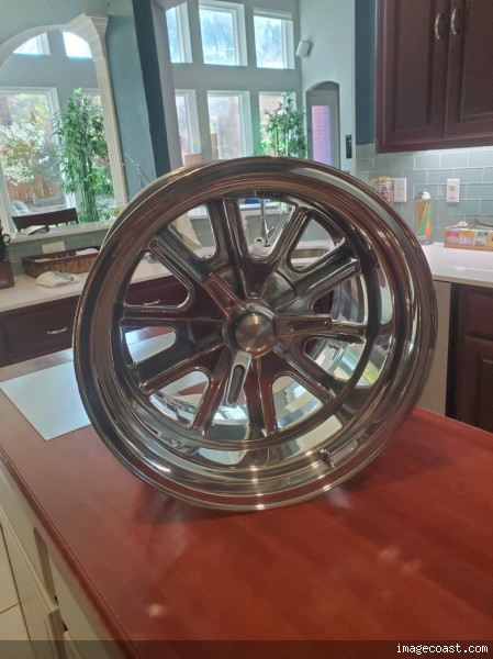 Pin drive wheels with two piece spindles